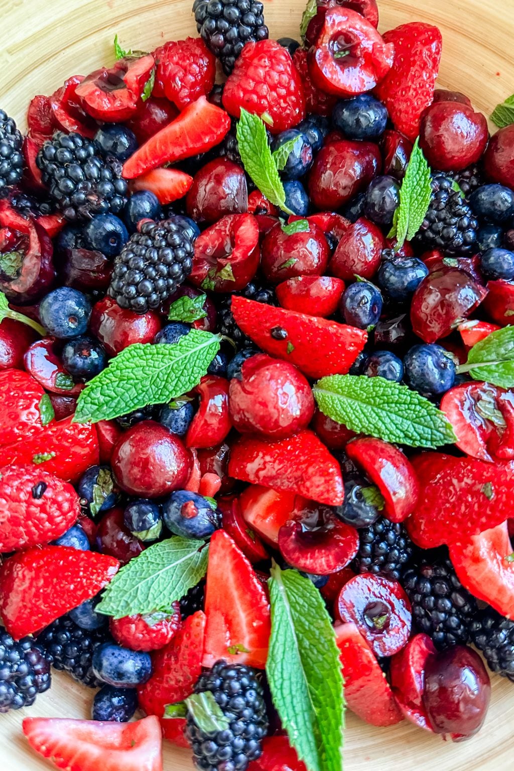 Cherry Berry Fruit Salad with Citrus Mint Dressing - Lovely Delites